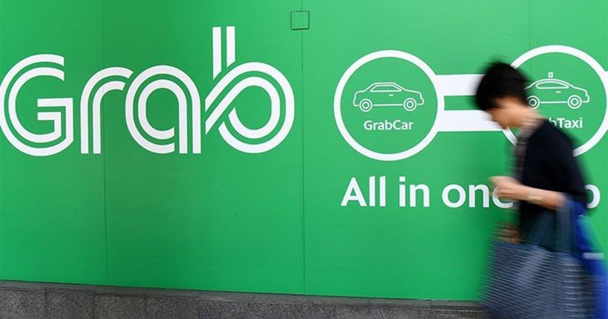 Grab attributes surge rates to inadequate supply of cars on the road in ...