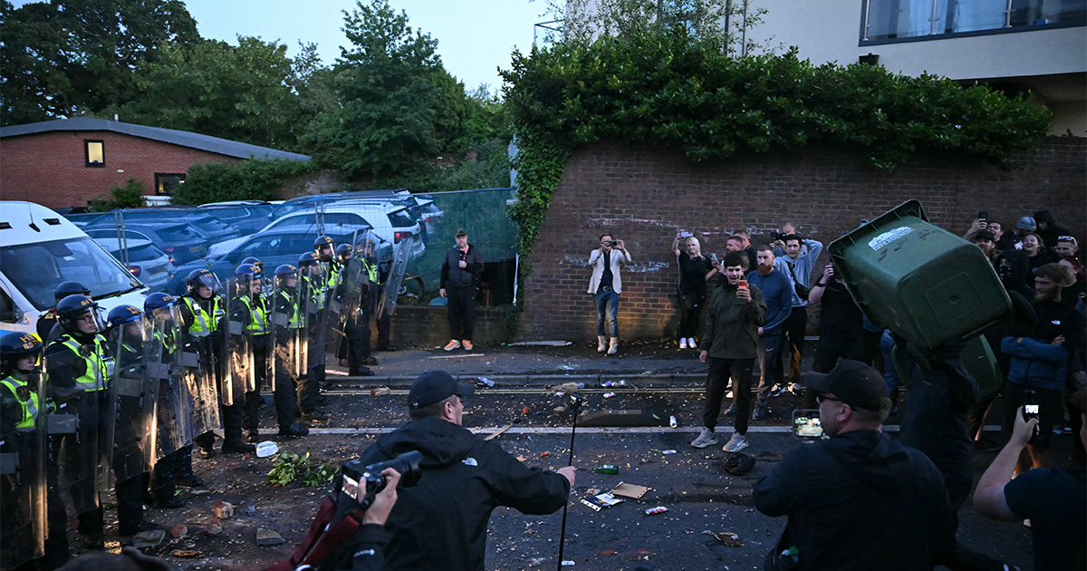 'I can't breathe': Clashes erupt after UK police handcuff dying student ...